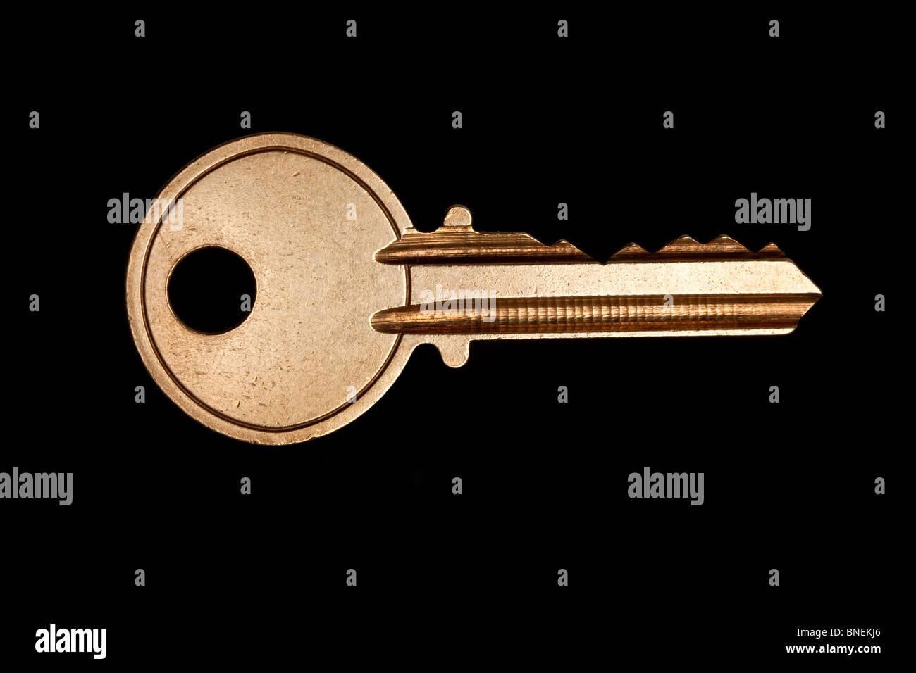 Golden House Key with black background Stock Photo - Alamy