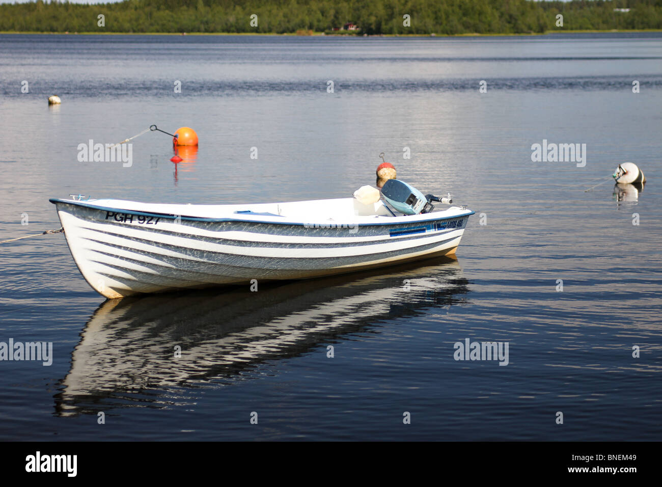 small boat in lake Stock Photo - Alamy