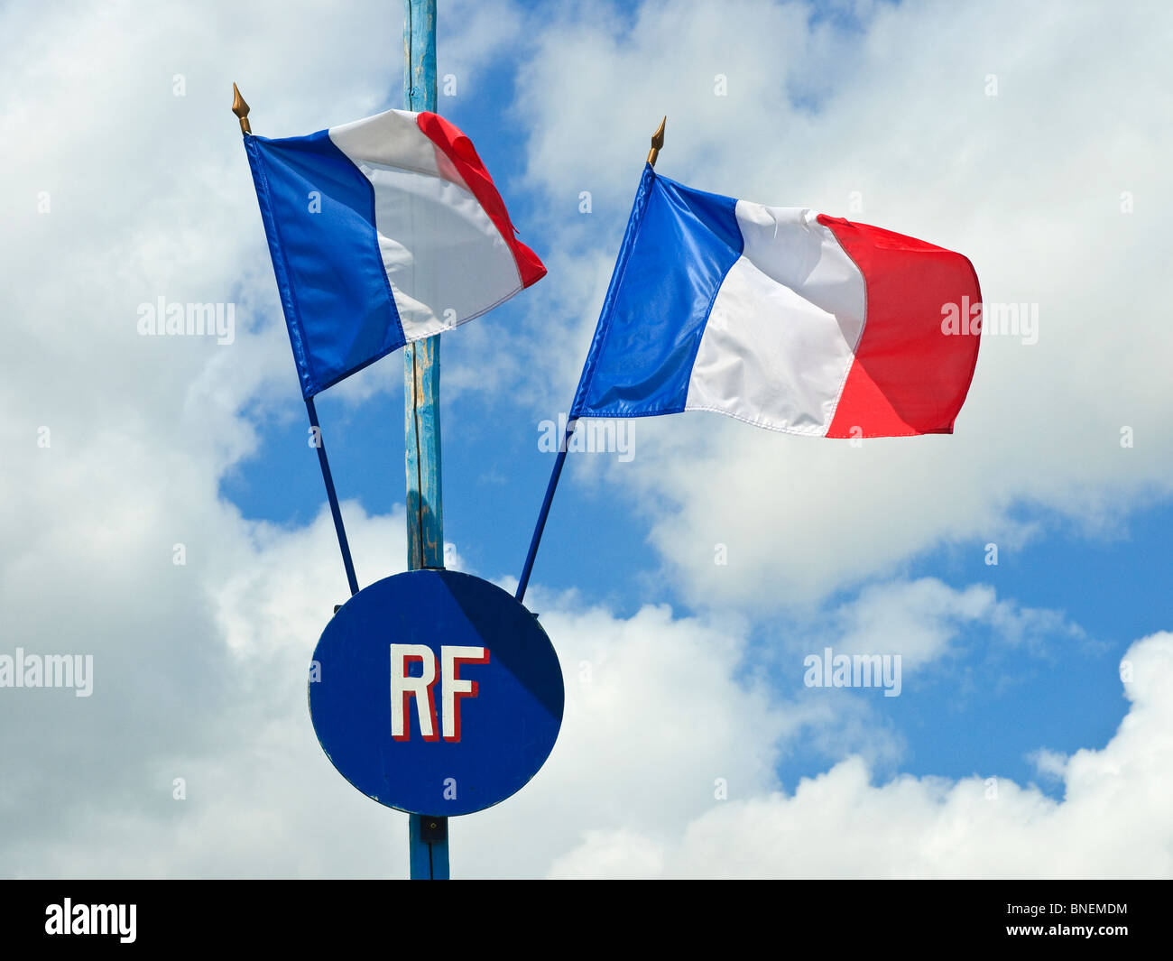 French Tricolour flags on flagpole Stock Photo - Alamy