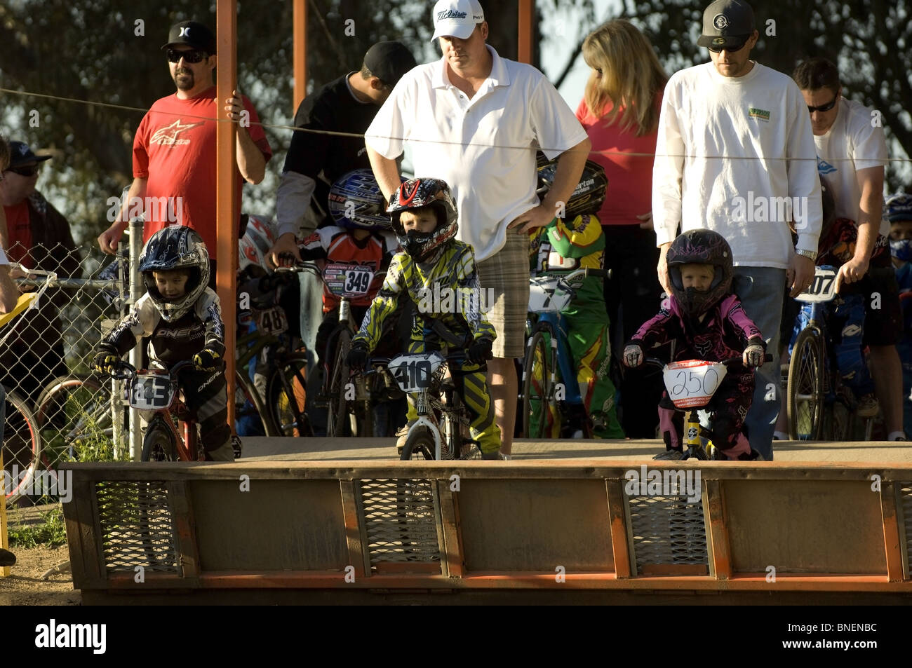 Young BMX bicycle riders at the local race track in Orange, California ...