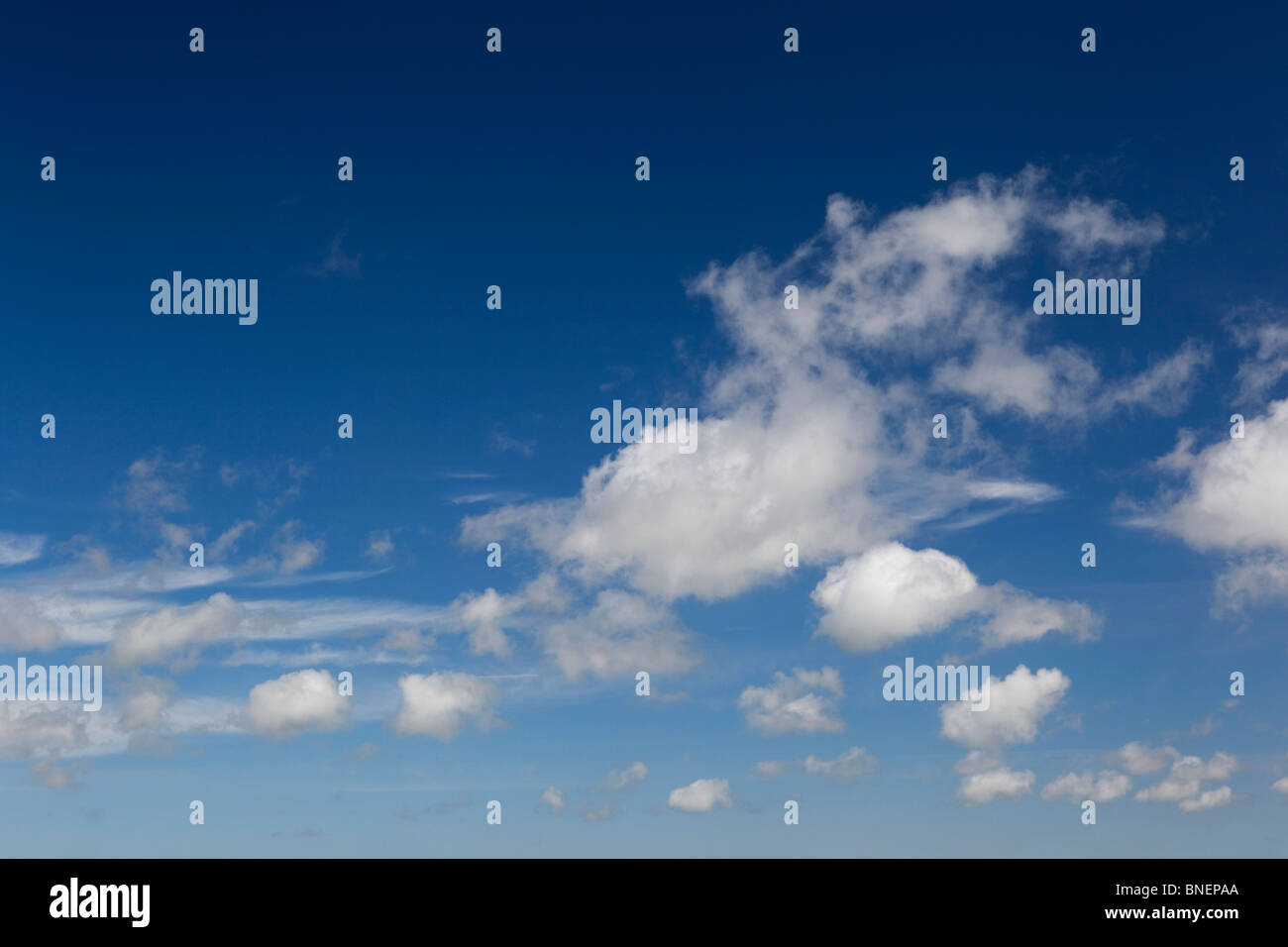 good fine weather small fluffy white cumulus clouds Stock Photo - Alamy