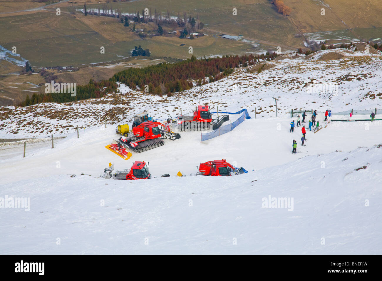 red piste bashers at coronet peak,queenstown Stock Photo - Alamy