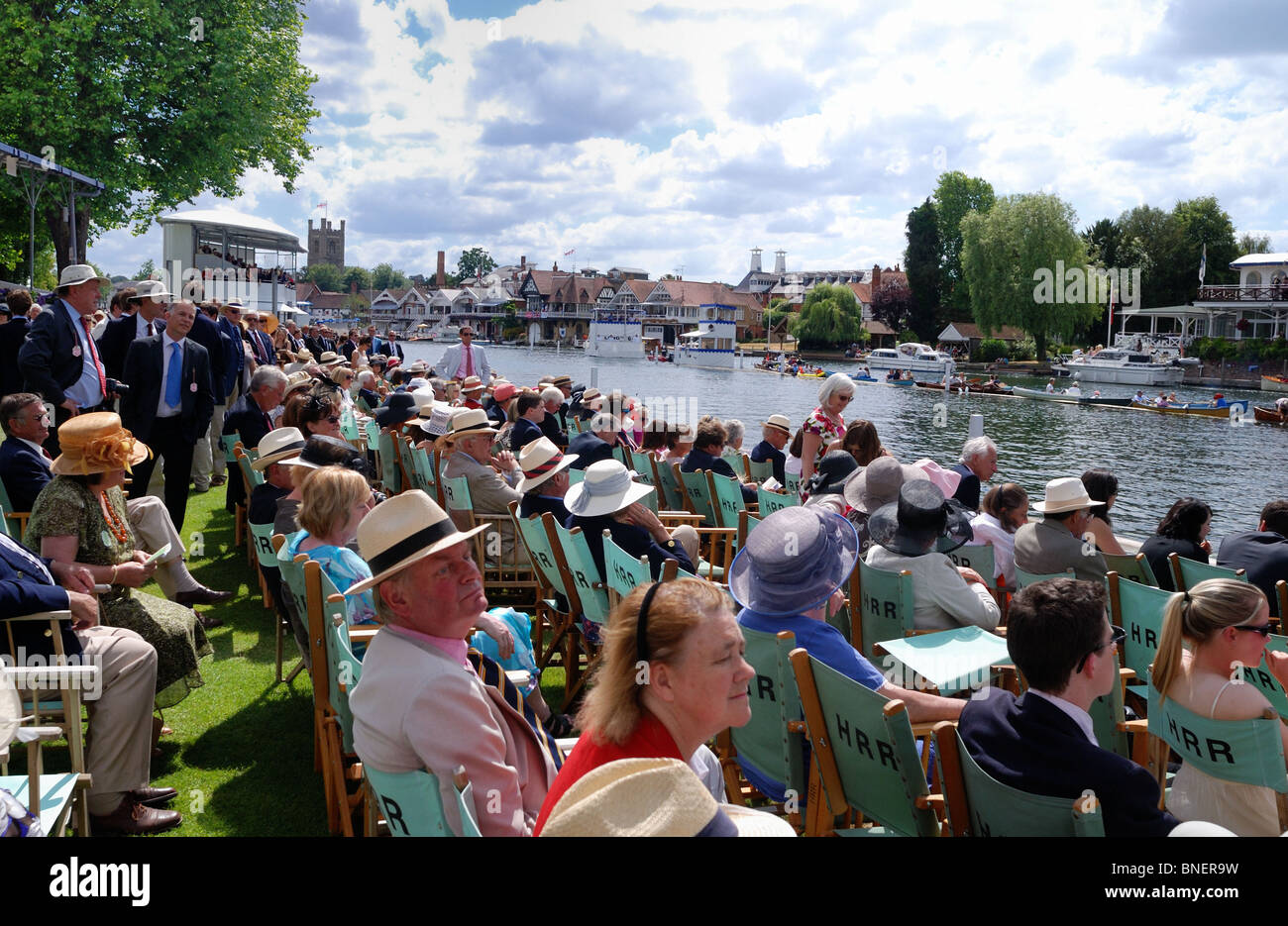 Spectators line the riverbank watching the racing at Henley Regatta ...