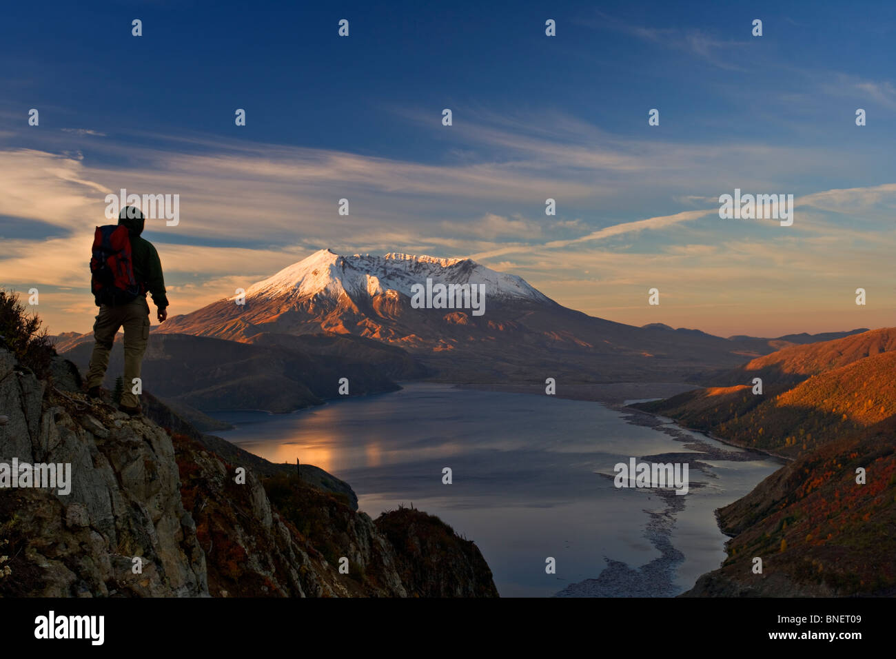 Hiker is enjoying view of autumn Mt. St. Helens volcano from near ...