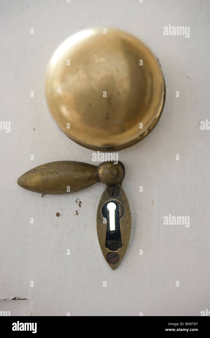 Key hole & brass handle Stock Photo - Alamy