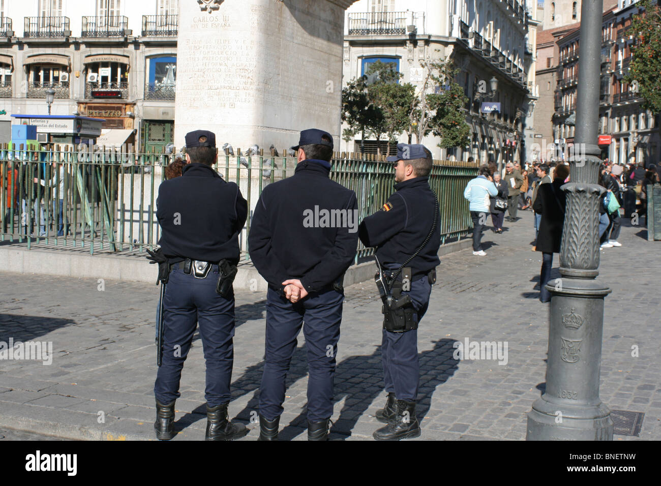 Three police officers in the Spanish National Police force at the Plaza ...