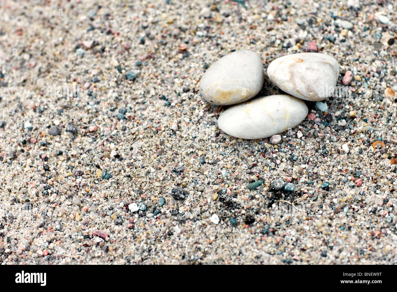 Three small stones Stock Photo - Alamy