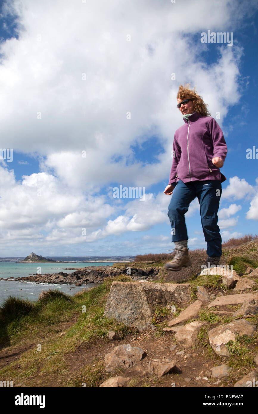 Sarah walking coastal path; Cornwall Stock Photo - Alamy