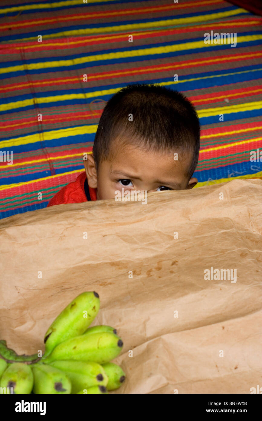 Boy peeking table hi-res stock photography and images - Alamy