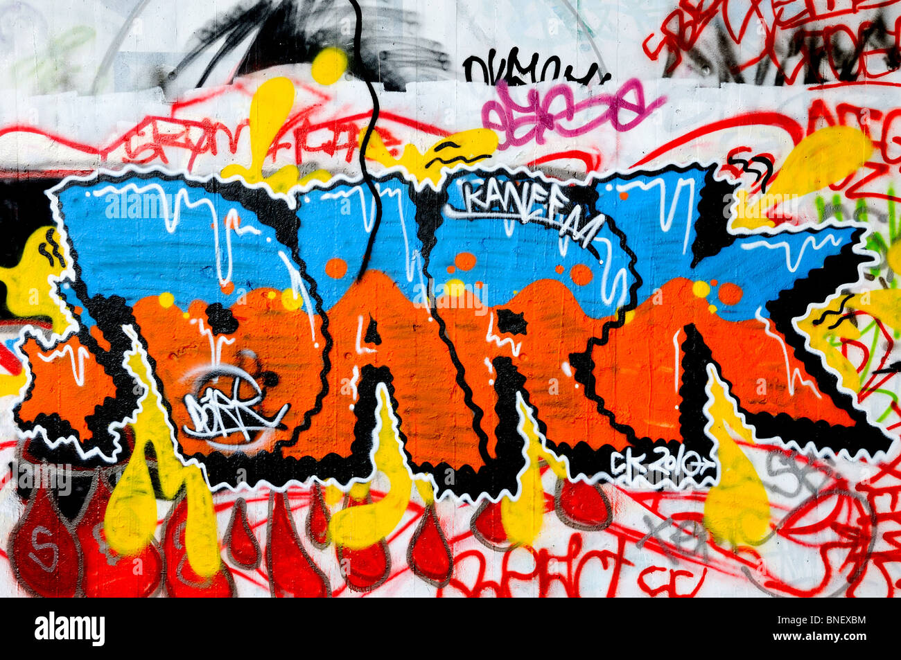 Brightly coloured graffiti on walls Stock Photo - Alamy
