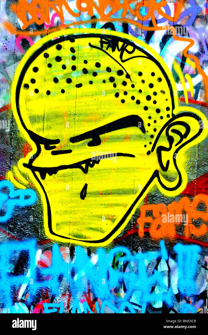 Brightly coloured graffiti on walls Stock Photo - Alamy