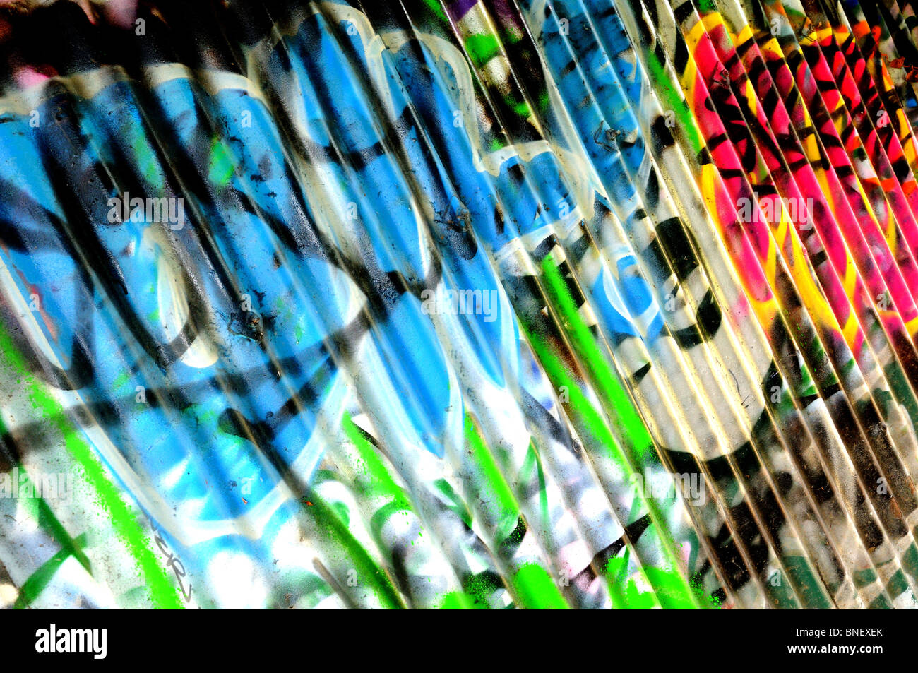 Brightly coloured graffiti on walls Stock Photo - Alamy