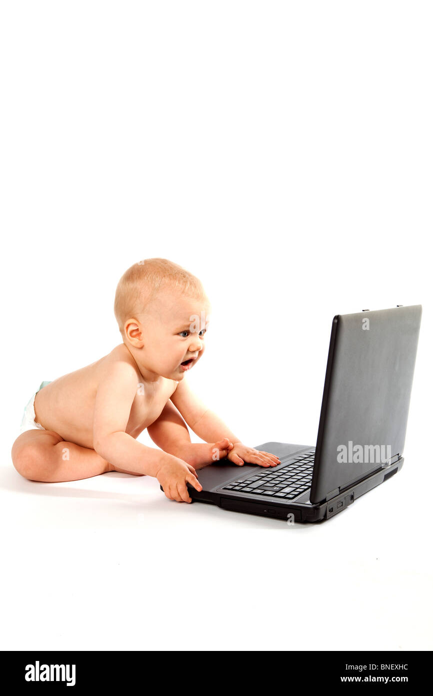 Little Baby Boy in Nappies Sitting in Front of a Laptop Stock Photo - Alamy