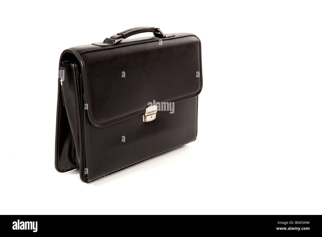 Black Closed Suitcase with a Handle on a White Isolated Background ...
