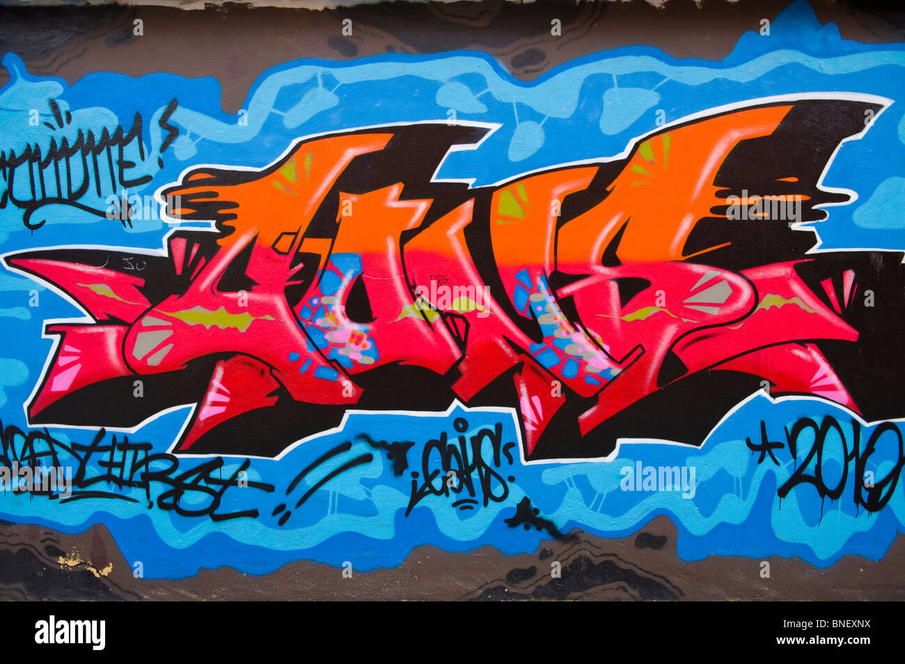 Urban graffiti art on wall of garage in back lane of Cardiff South ...