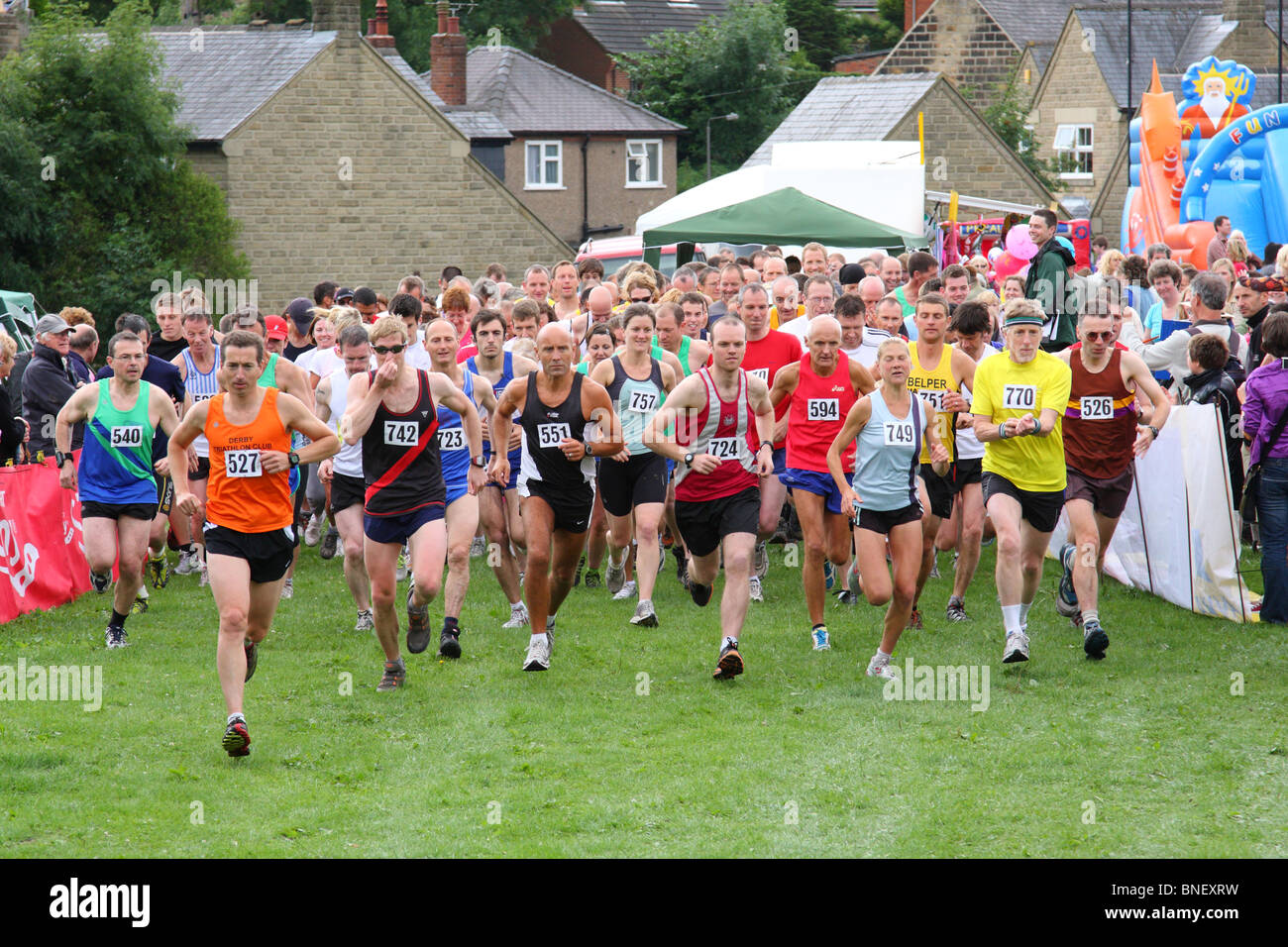 Runners at a Tors Community Sports organised run in Derbyshire, England ...