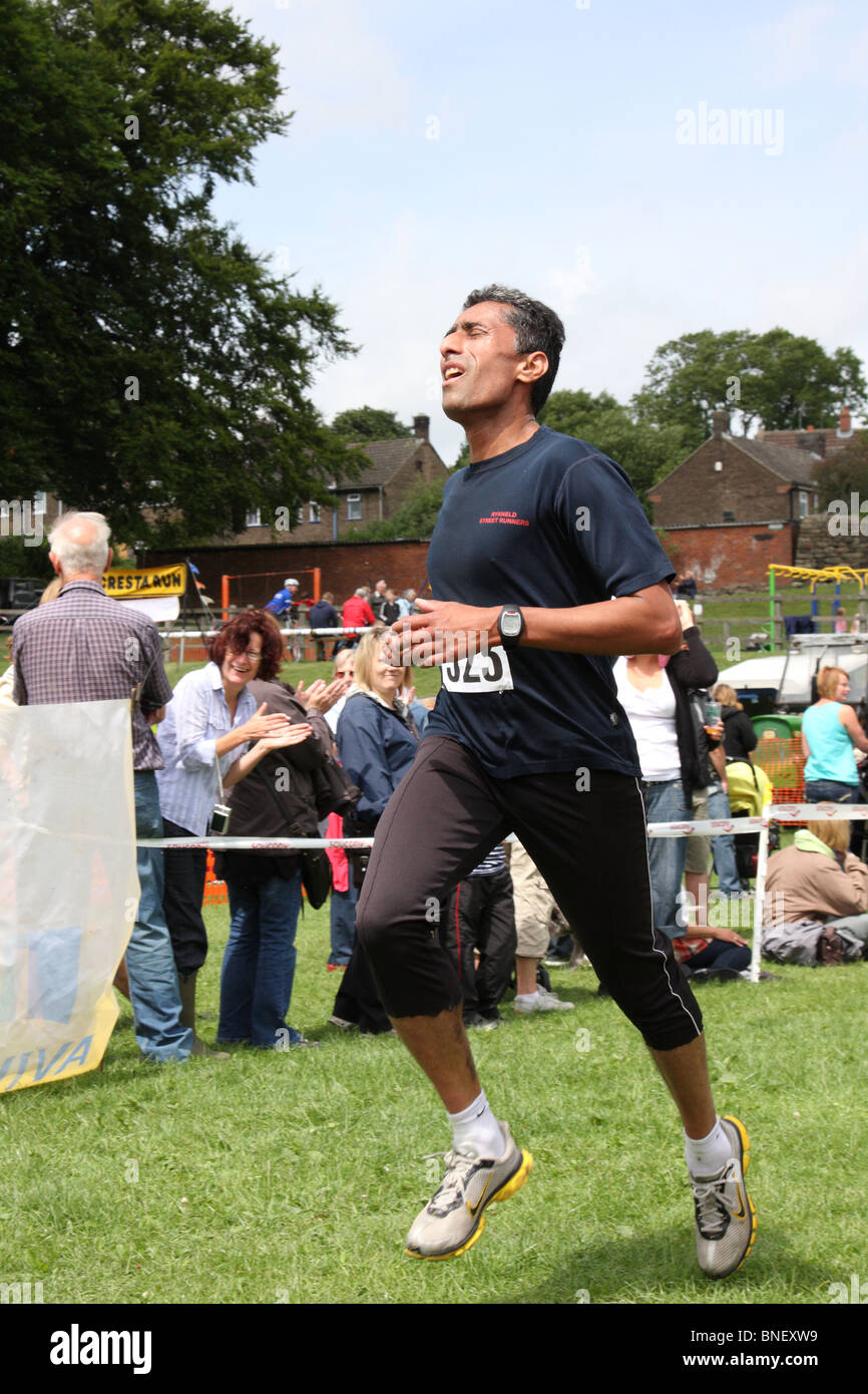 A runner at a Tors Community Sports organised run in Derbyshire ...