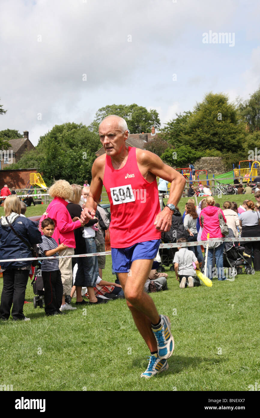 A runner at a Tors Community Sports organised run in Derbyshire ...