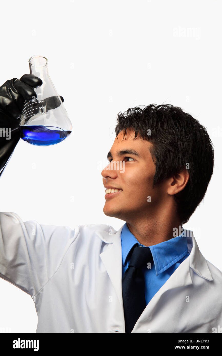 lab technician holding a flask with a fluid inside Stock Photo - Alamy