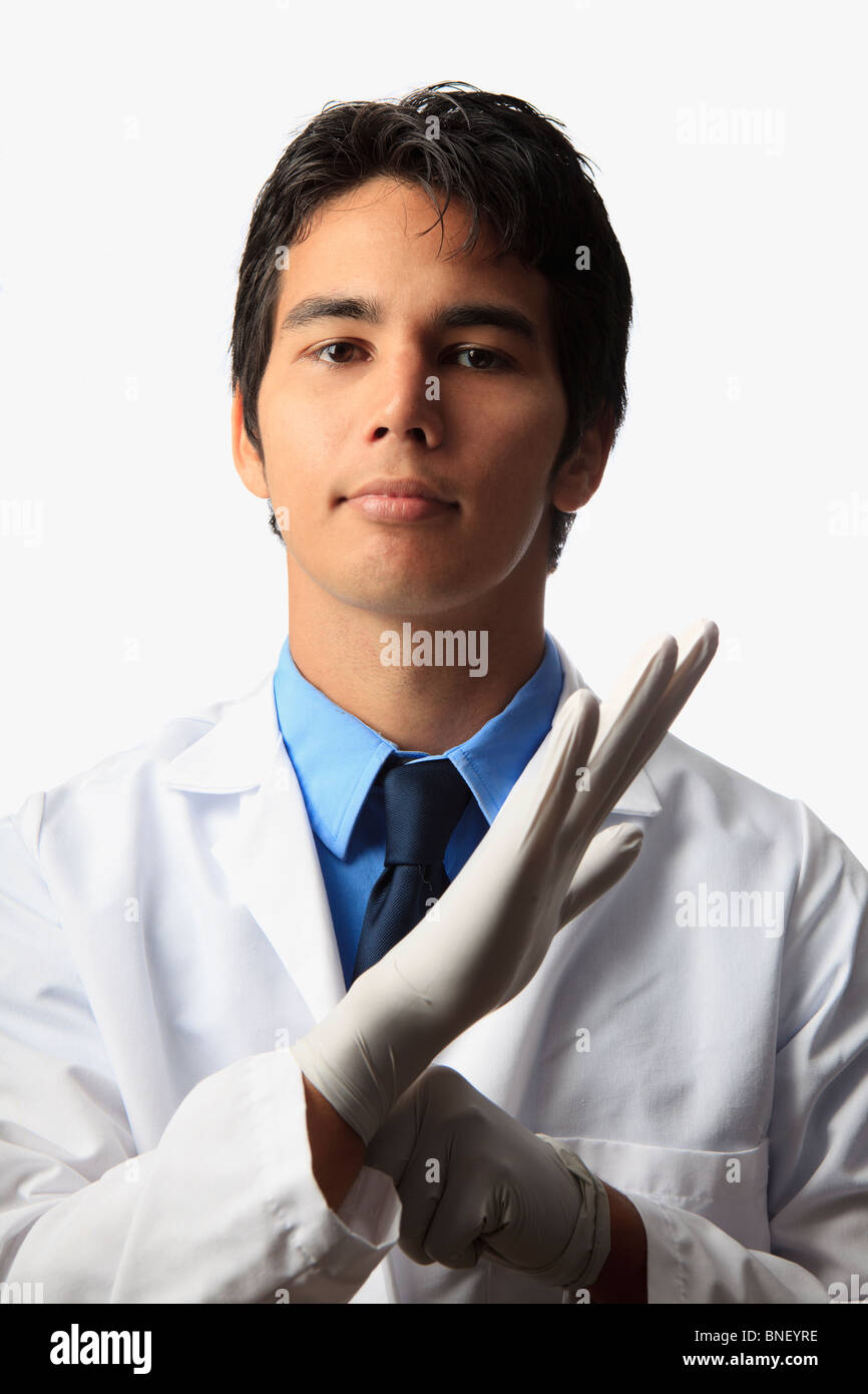 lab technician putting on his gloves Stock Photo - Alamy