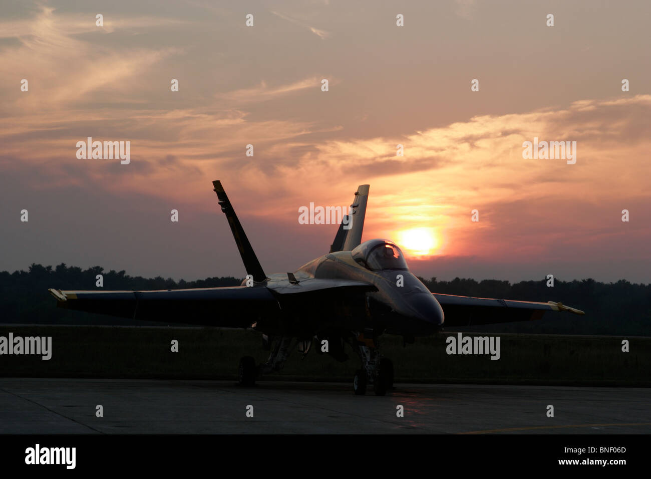 A US Navy Blue Angels aircraft at sunset Stock Photo - Alamy