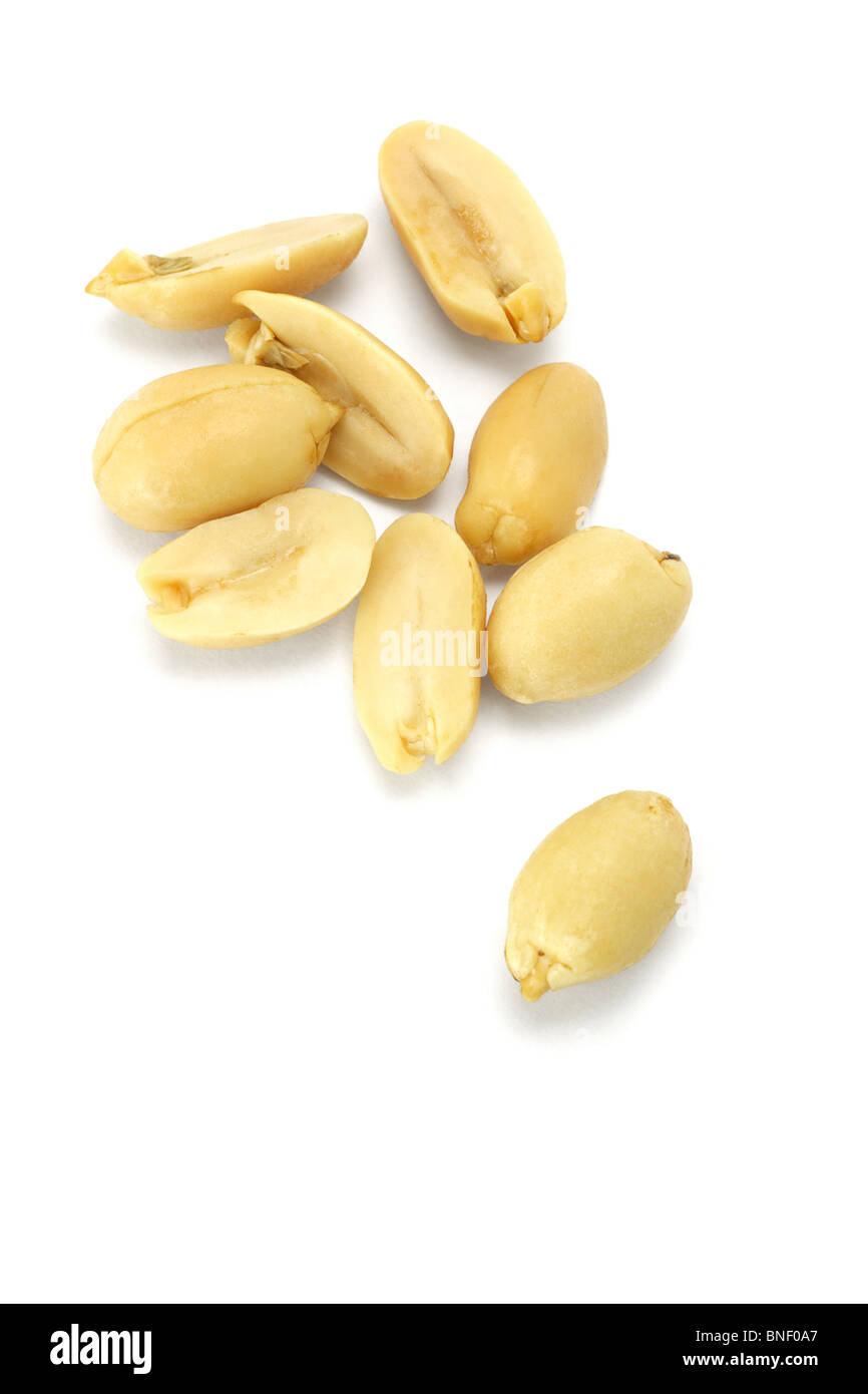 Processed pea nuts isolated on white background Stock Photo - Alamy