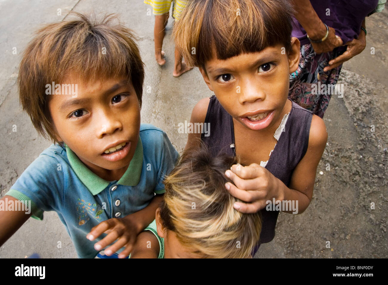 Poverty children begging hi-res stock photography and images - Alamy