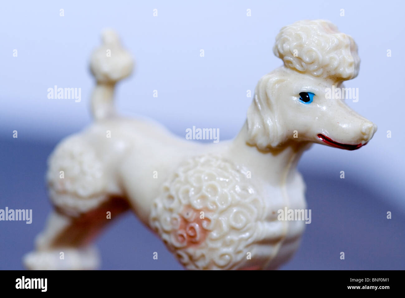 Plastic toy poodle Stock Photo - Alamy