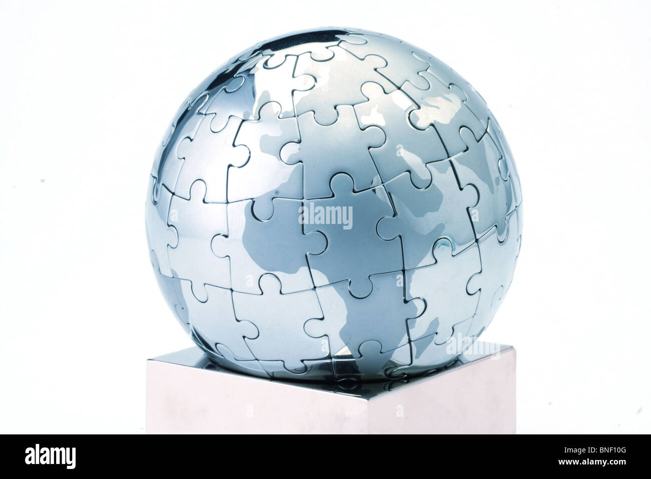 Globe puzzle on white Stock Photo - Alamy