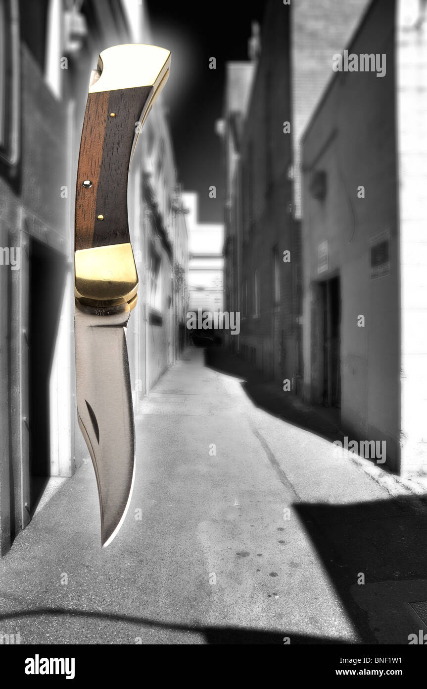 A color knife floats on a background of a black and white alleyway that ...