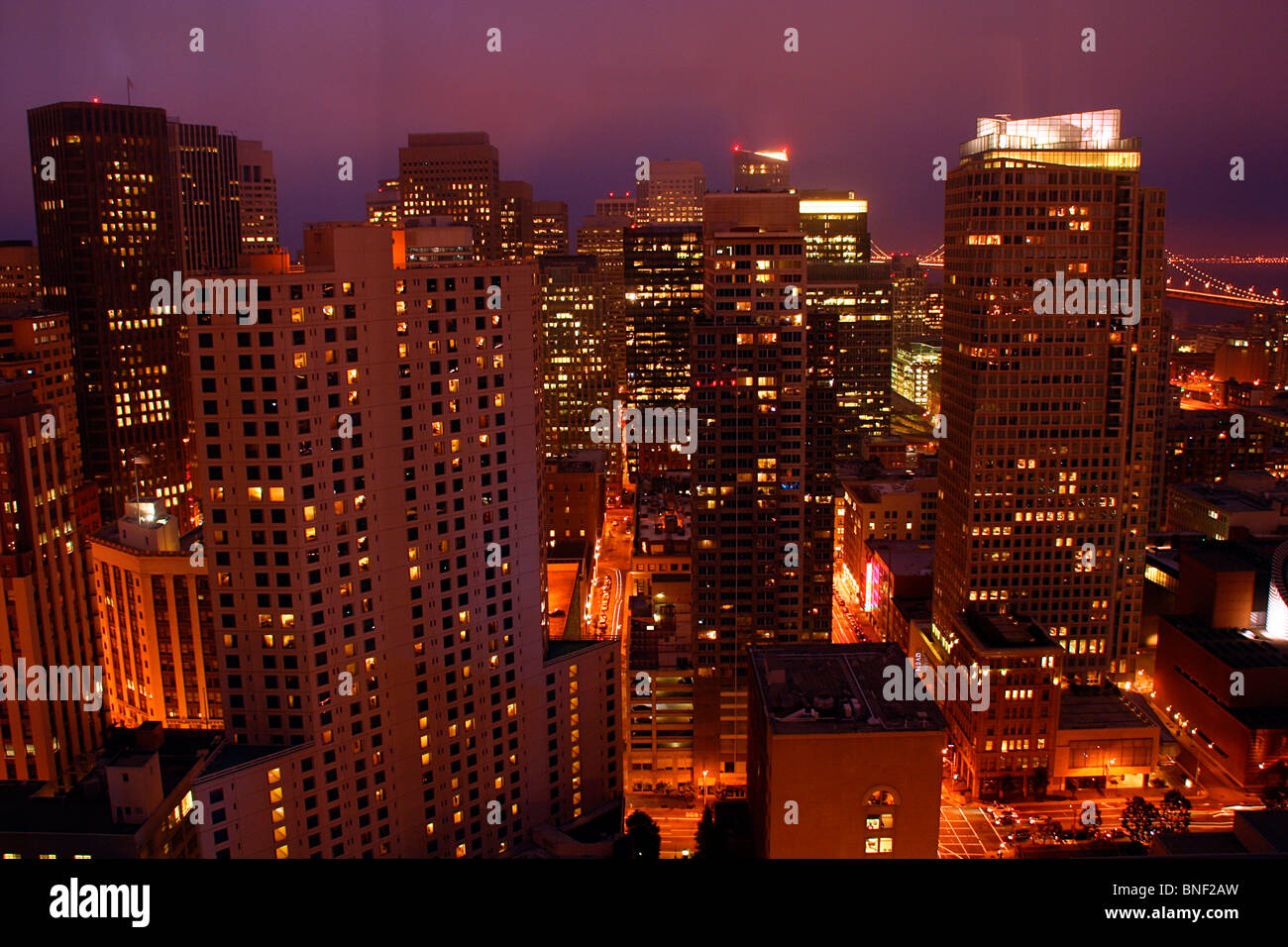 Buildings in a city lit up at night, San Francisco, California, USA ...