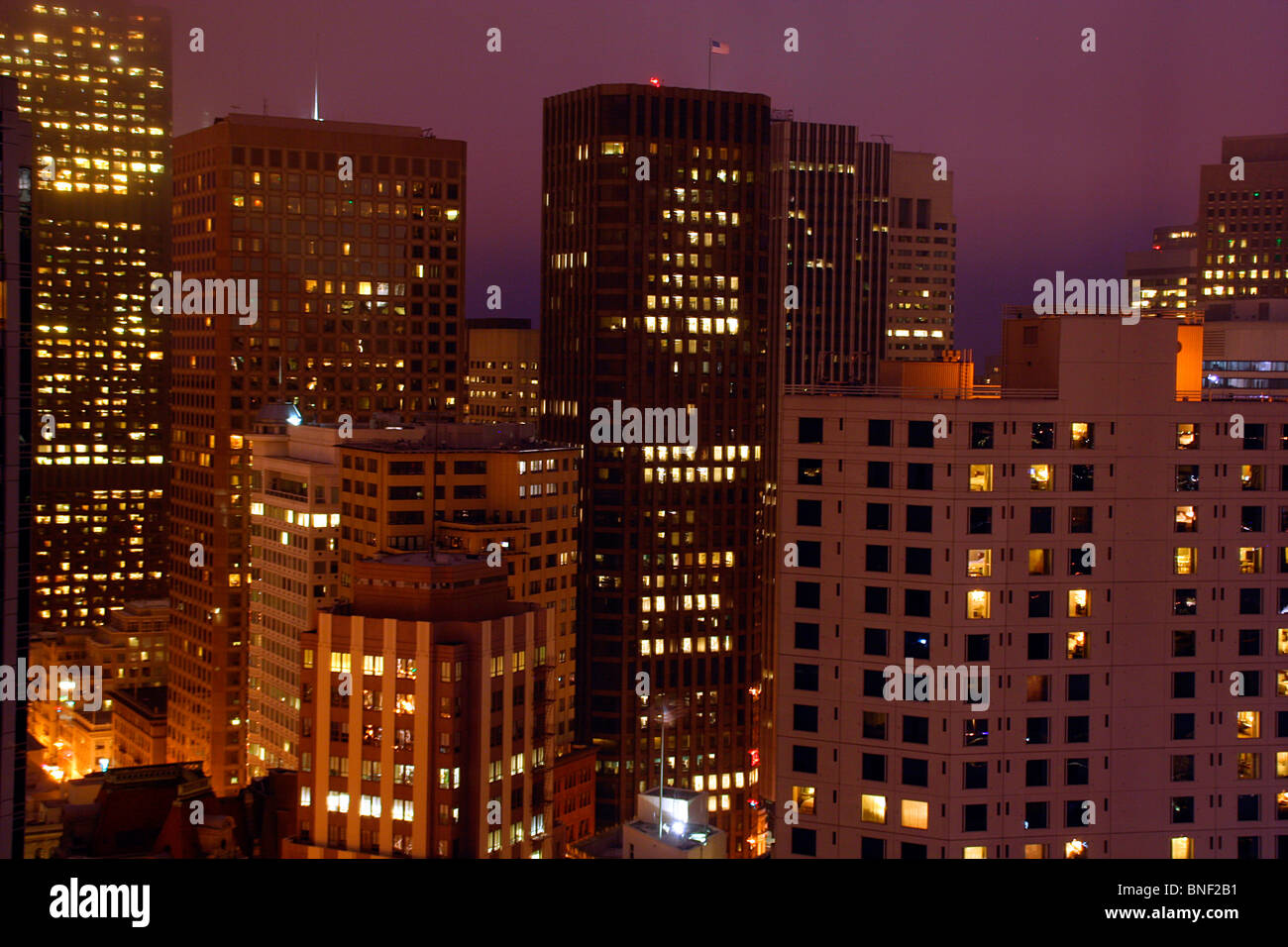 Buildings in a city lit up at night, San Francisco, California, USA ...