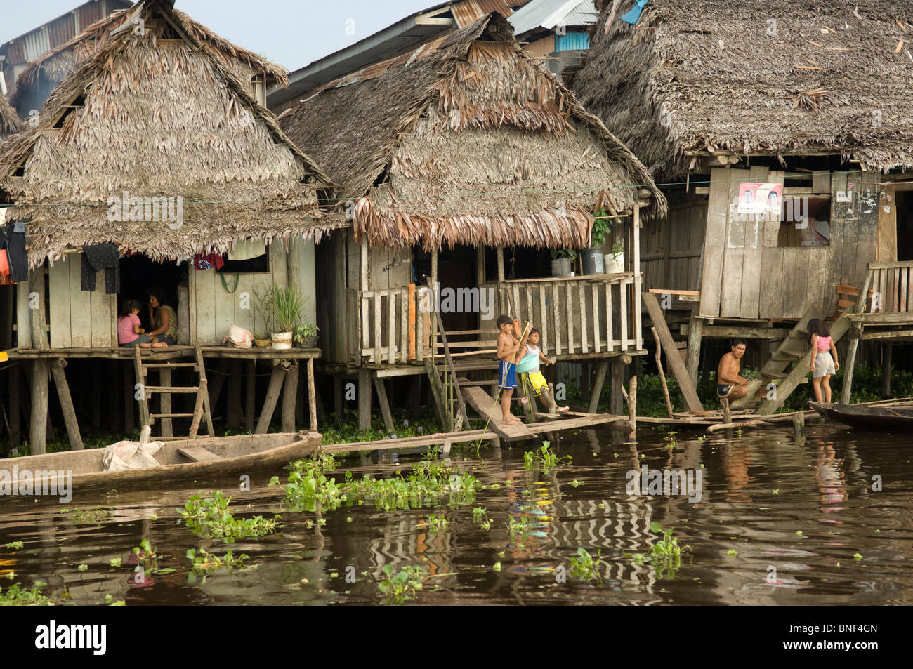 Stilt houses at the waterfront, Requena, Rio Tapiche, Loreto Region ...