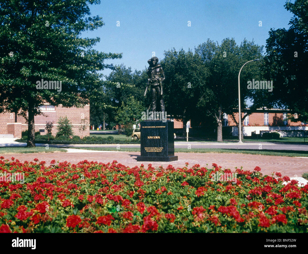 Boys Town Statue and flower in a park, Nebraska, USA Stock Photo - Alamy