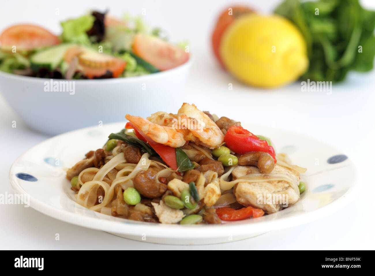 Authentic Thailand Style Street Food Stir-Fried Pad Thai Noodles With Chicken And Prawns Against ...