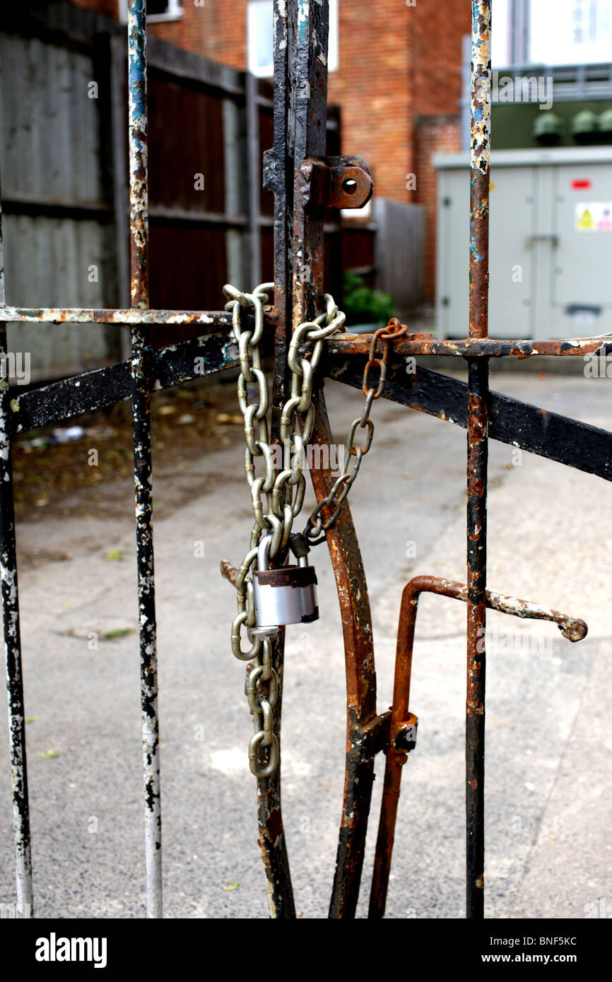 Padlocked Iron Gate Stock Photo - Alamy