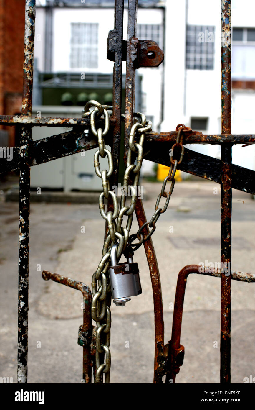 Padlocked Iron Gate Stock Photo - Alamy