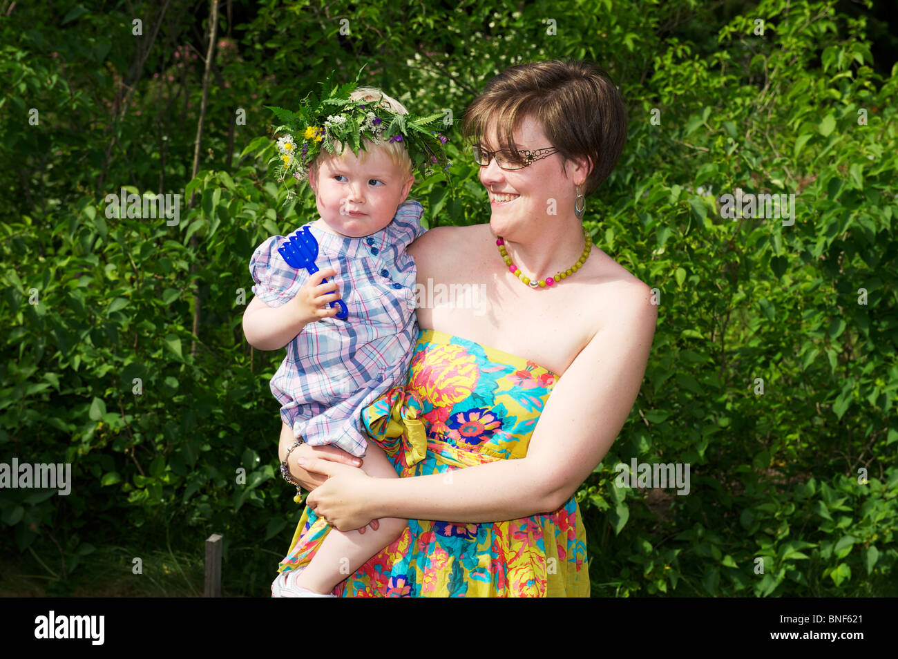 Child and her mother Stock Photo - Alamy