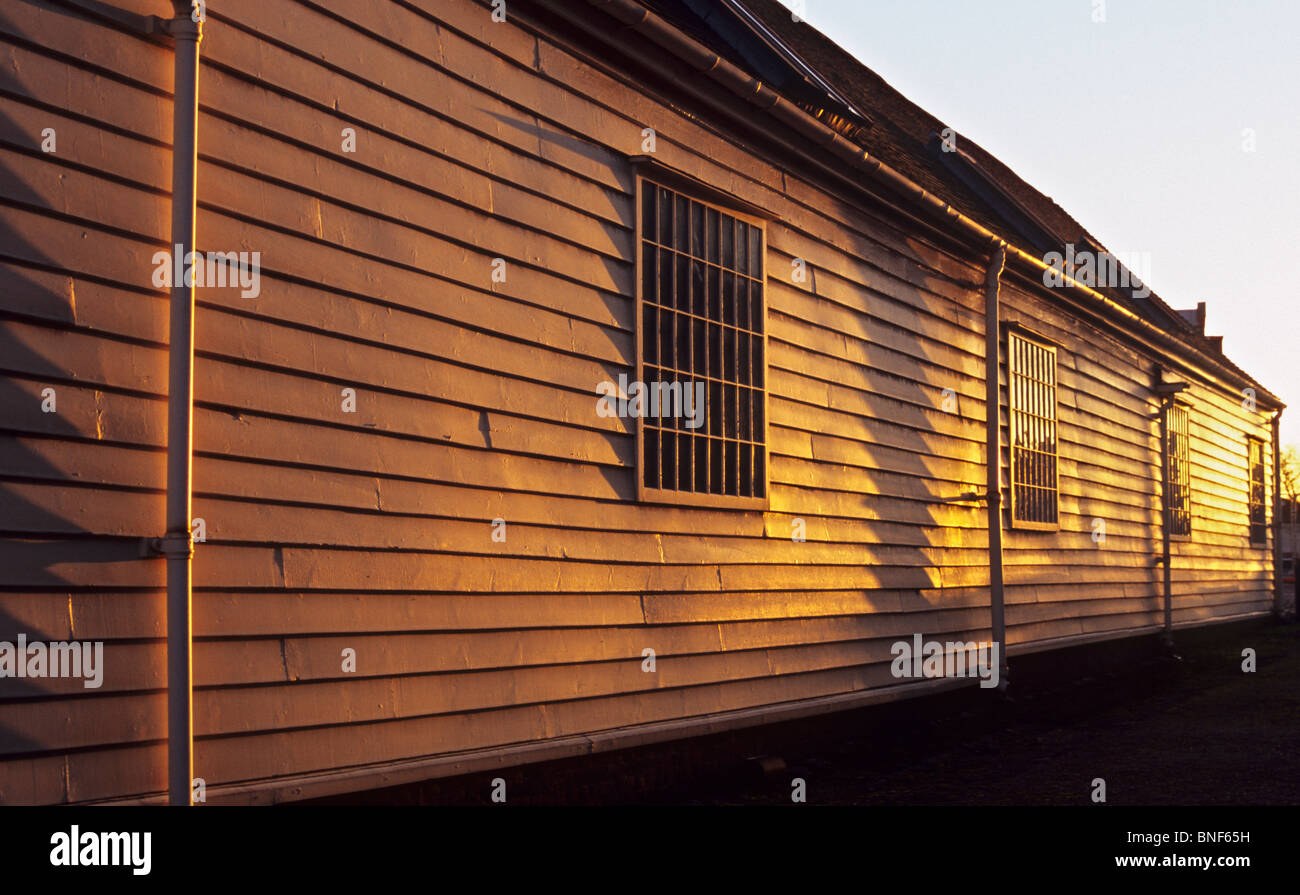 Wooden buildings in evening light, Chatham Historic Dockyard, Kent, UK ...