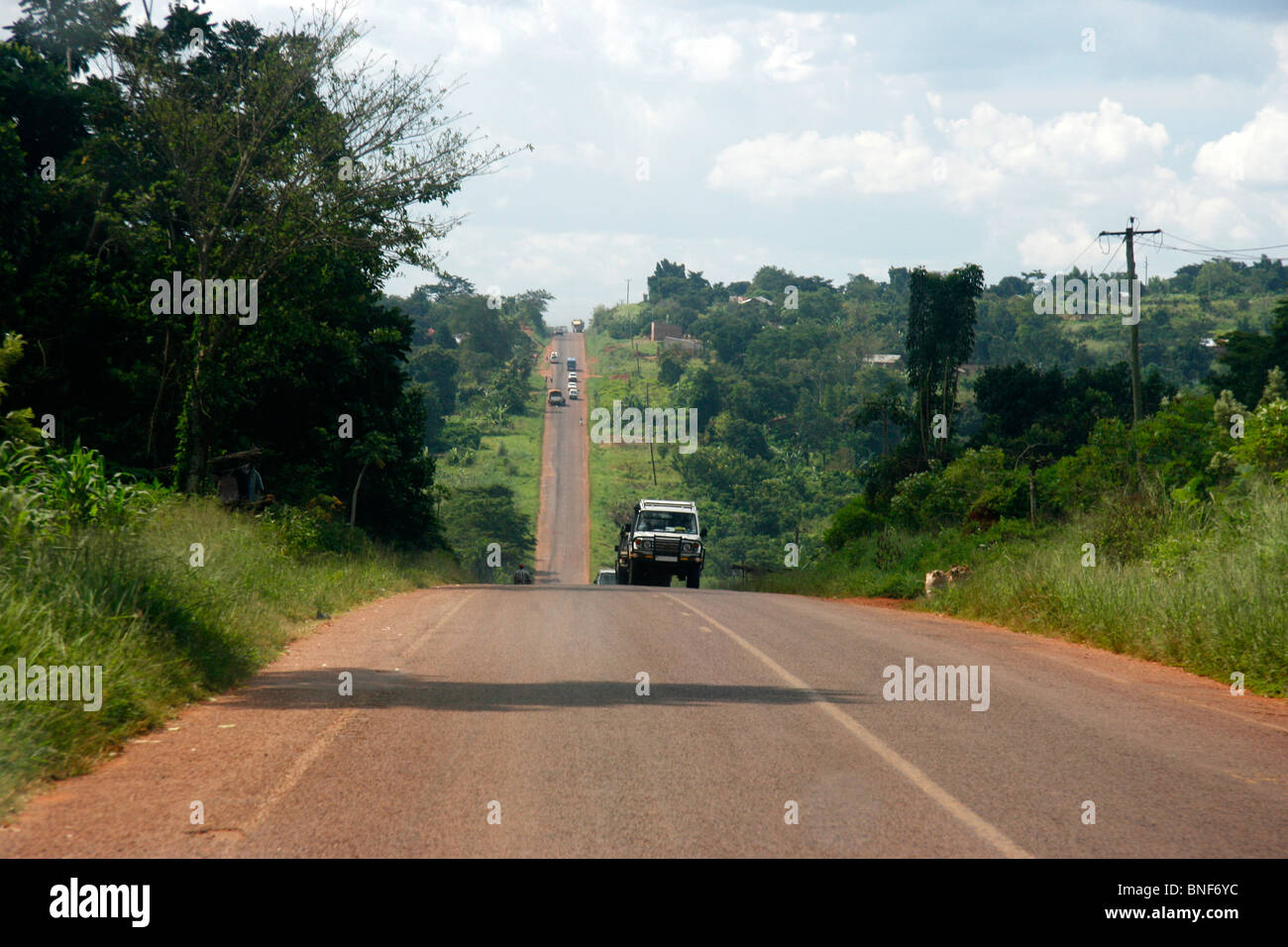 View of a rural Ugandan road Stock Photo - Alamy