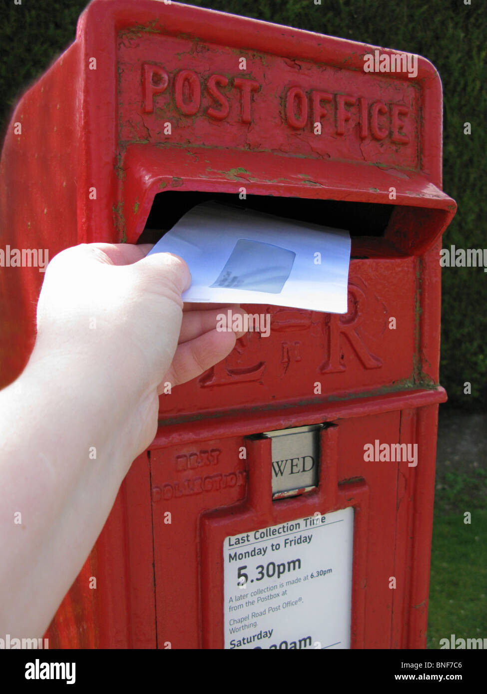 Woman posting letter in post hi-res stock photography and images - Alamy
