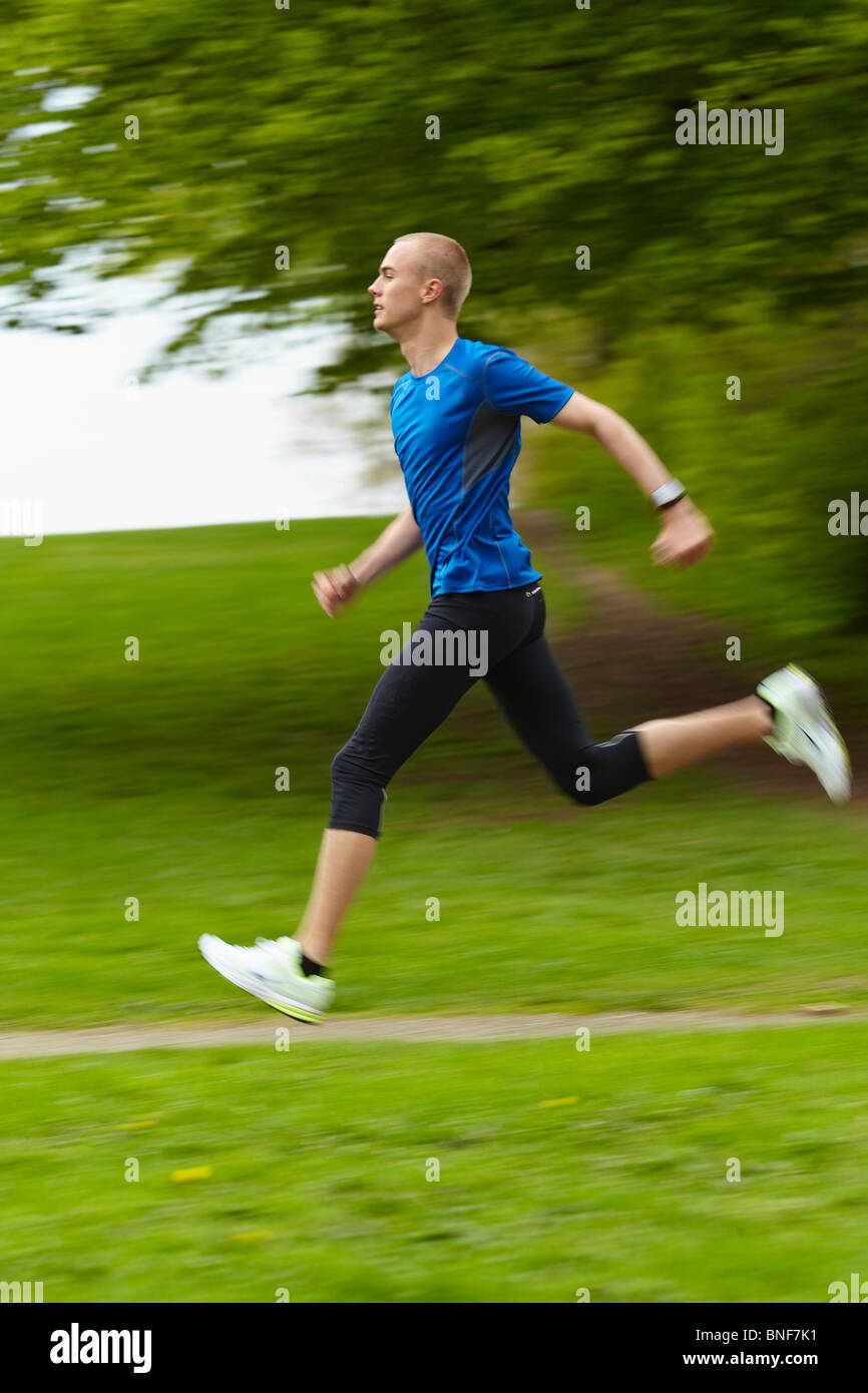 Man running in nature Stock Photo - Alamy