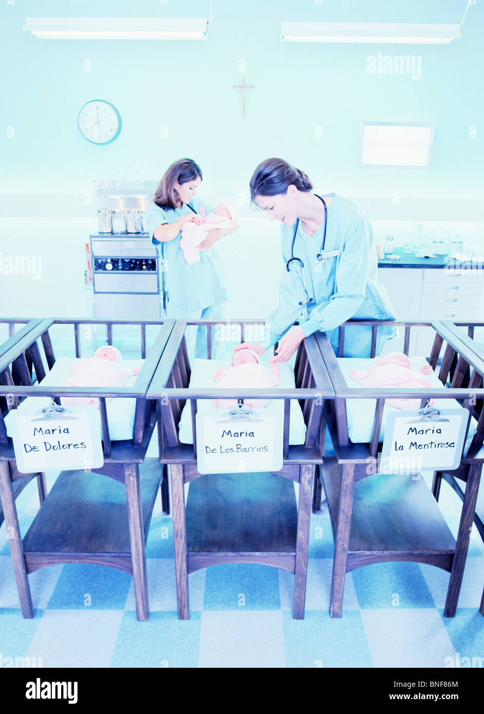 Nurses taking care of babies at the hospital maternity ward Stock Photo ...