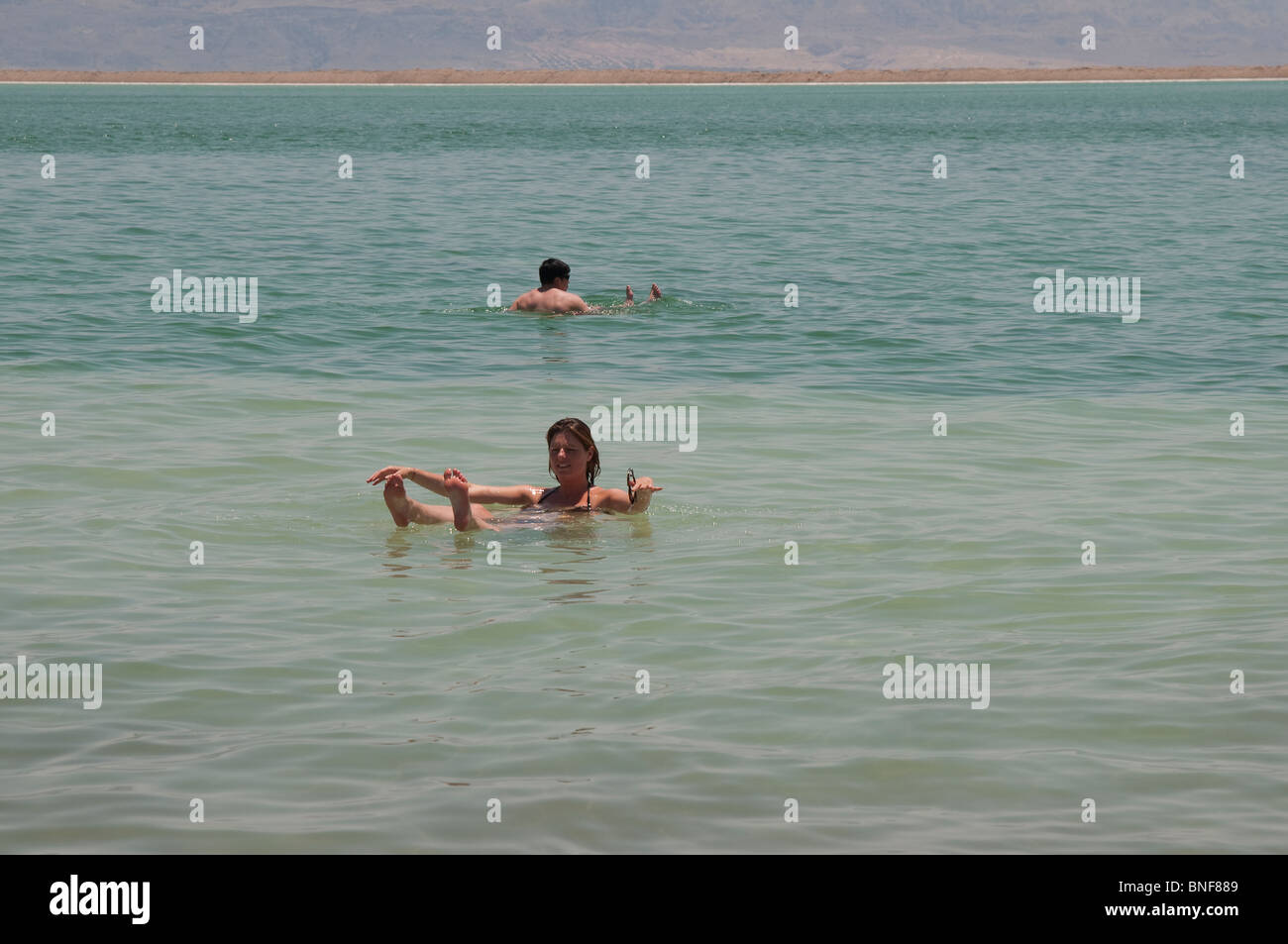 Floating in the Dead Sea ,Israel Stock Photo - Alamy