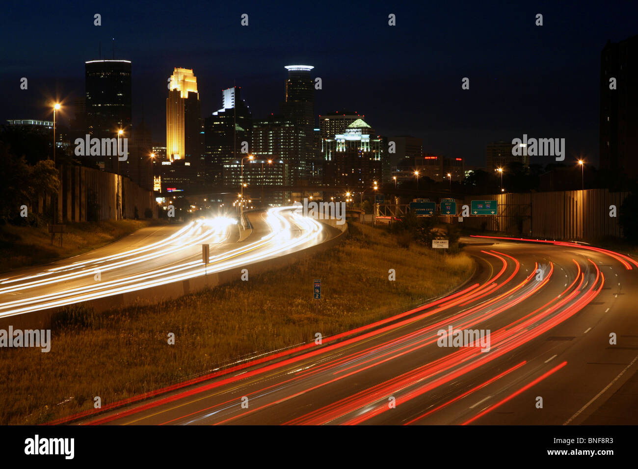 USA, Minnesota, Minneapolis, Traffic on freeway with skyline Stock ...