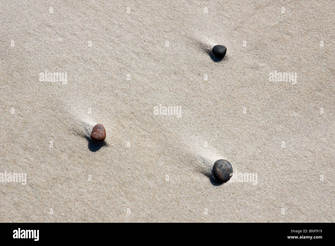 Dust and stones at the beach Stock Photo - Alamy