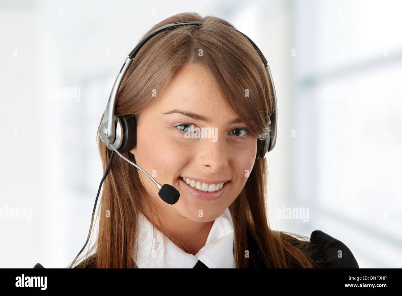 Beautiful Call Center Woman Wearing A Telephone Headset Stock Photo - Alamy
