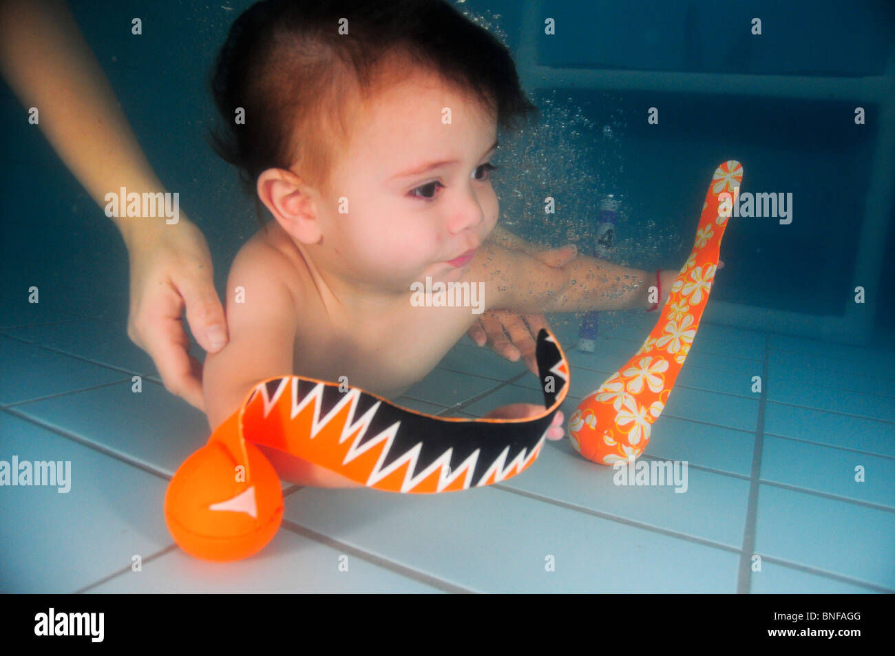 Swimming underwater baby pool hi-res stock photography and images - Alamy