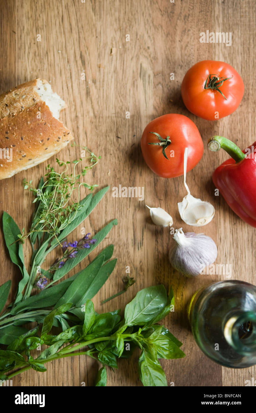 Ingredients of Italian cooking on the cutting board Stock Photo - Alamy