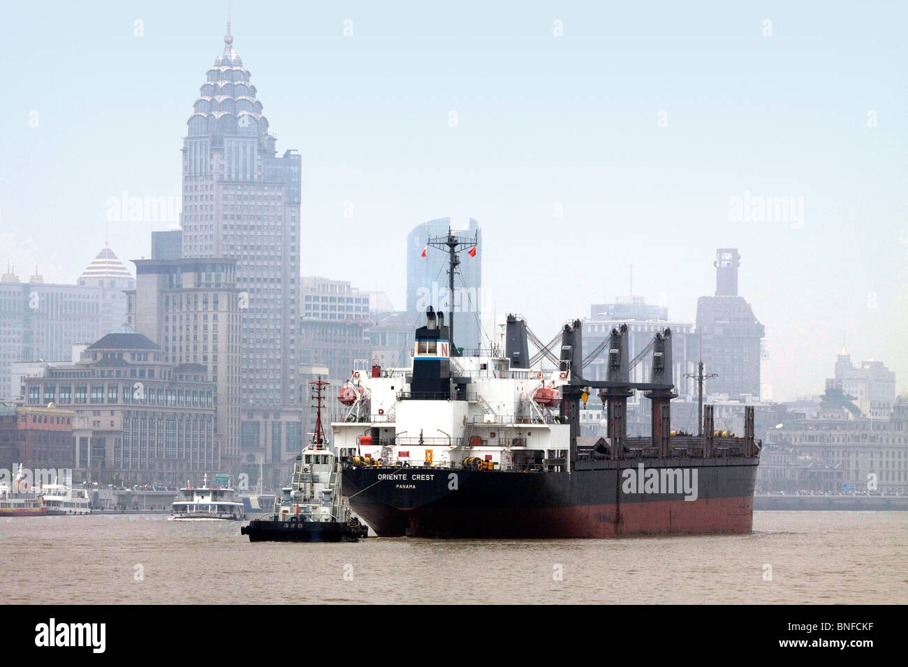 Cargo ship in Huangpu River Shanghai China Stock Photo - Alamy